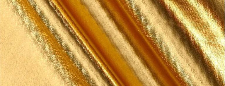 Elevate Your Style with Gold Pleated Lamé Fabric: A Fashion Essential